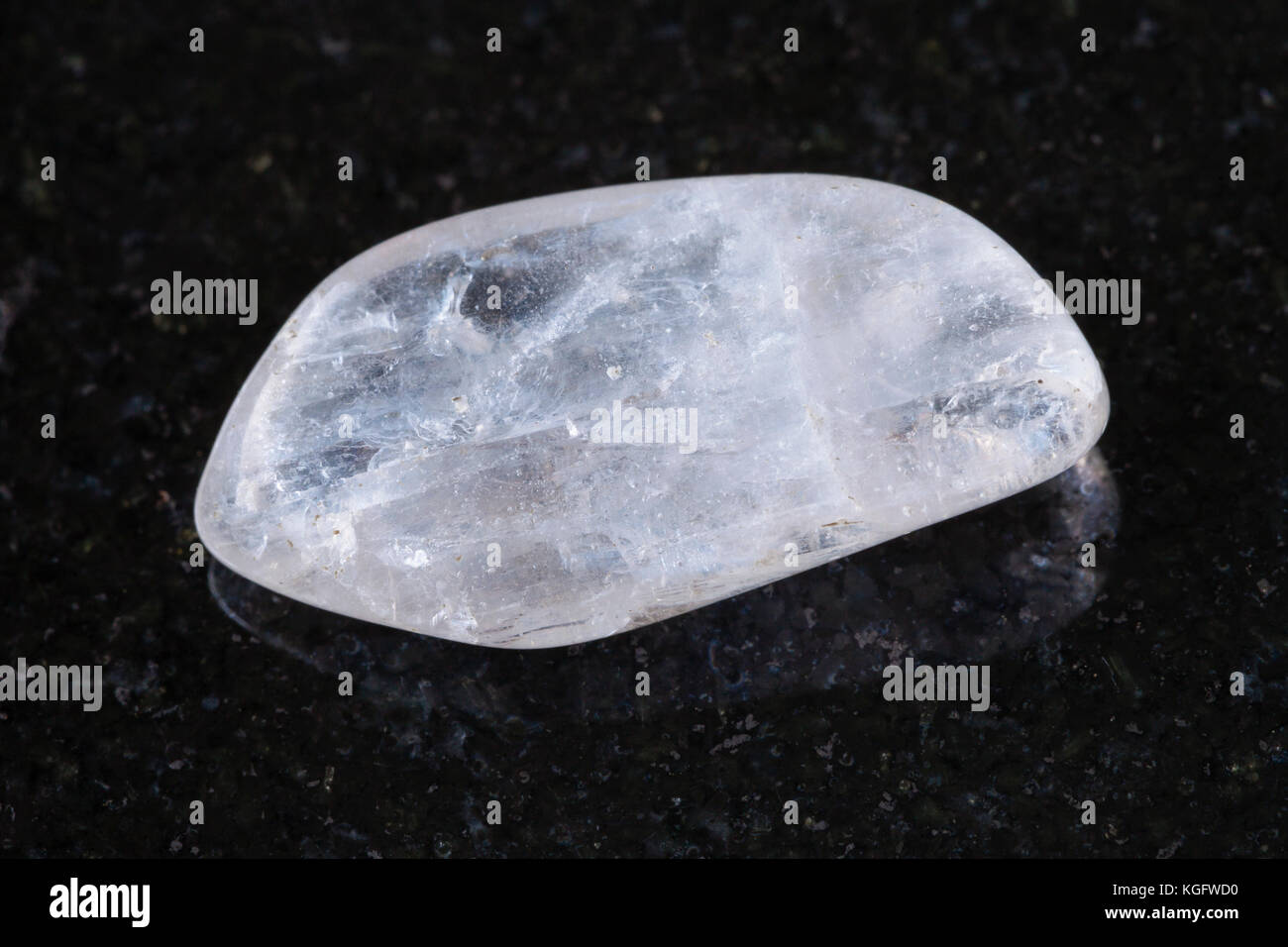 macro shooting of natural mineral rock specimen - tumbled Natrolite ...