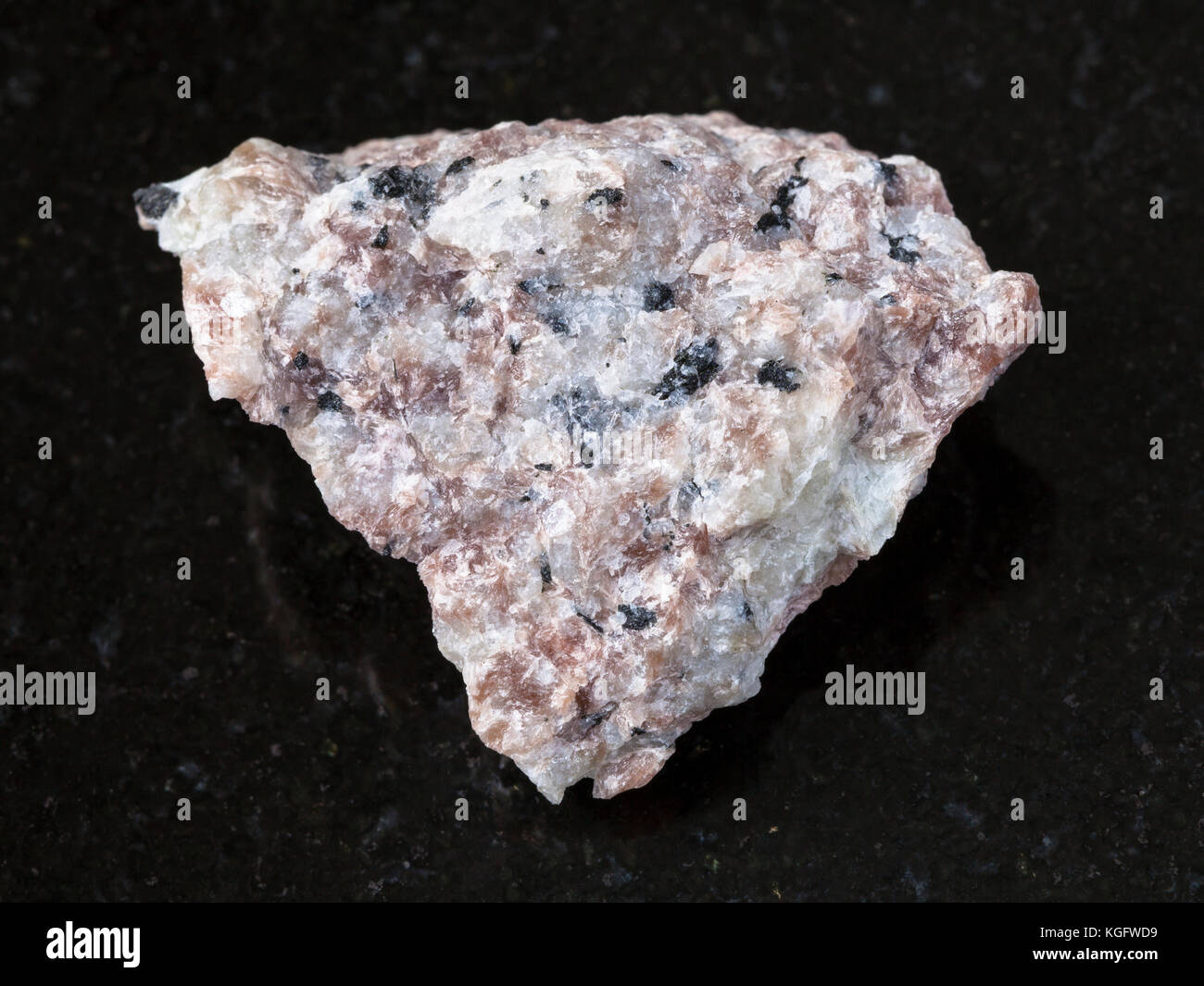 macro shooting of natural mineral rock specimen - rough Miserite stone ...