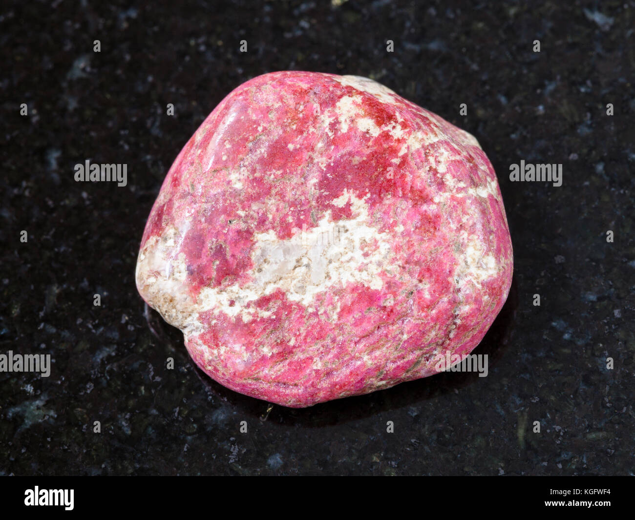 macro shooting of natural mineral rock specimen - polished Thulite ...