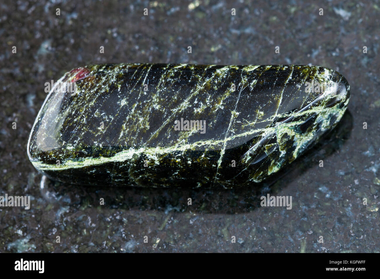 macro shooting of natural mineral rock specimen - polished Diopside ...