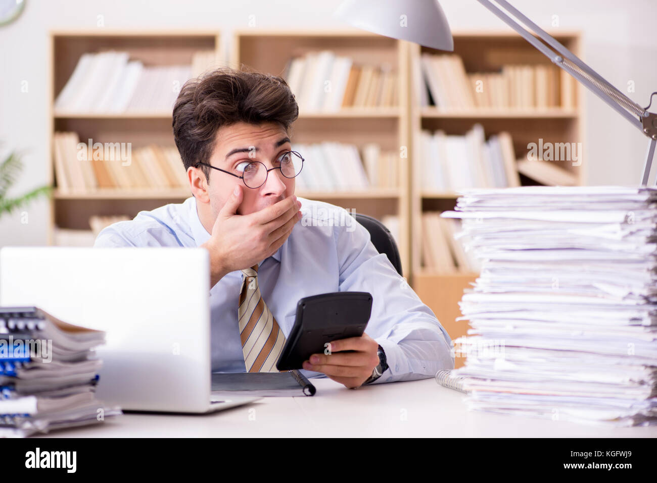 Funny accountant bookkeeper working in the office Stock Photo - Alamy