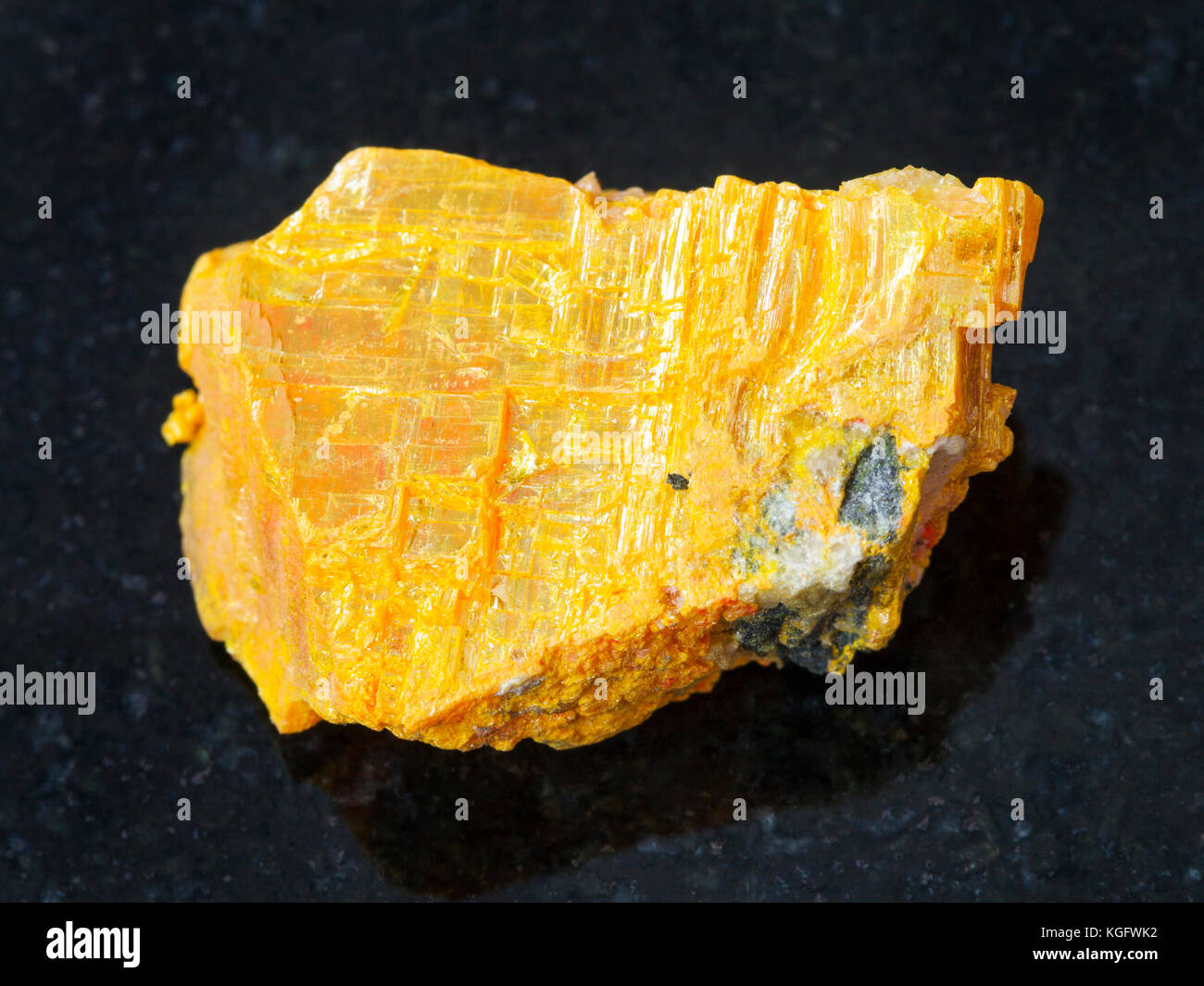 macro shooting of natural mineral rock specimen - rough native orpiment ...
