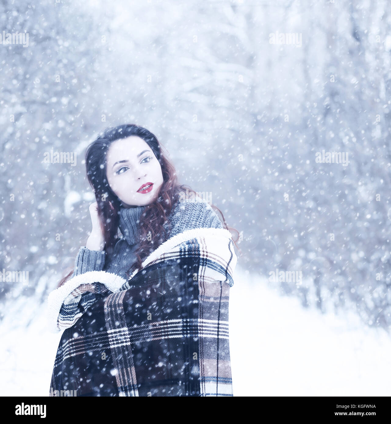 Beautiful girl in a beautiful winter snow Stock Photo - Alamy