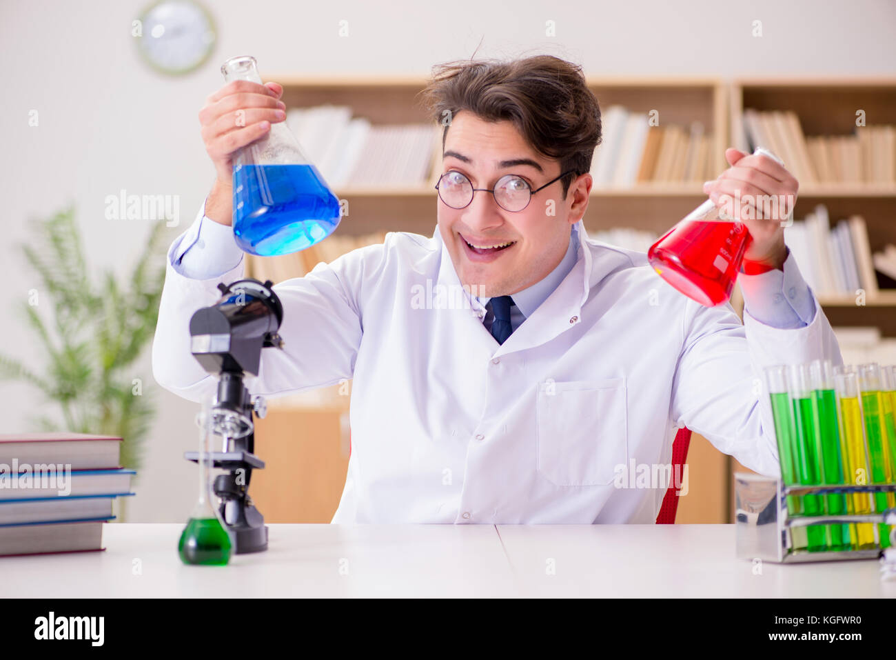 Mad crazy scientist doctor doing experiments in a laboratory Stock ...