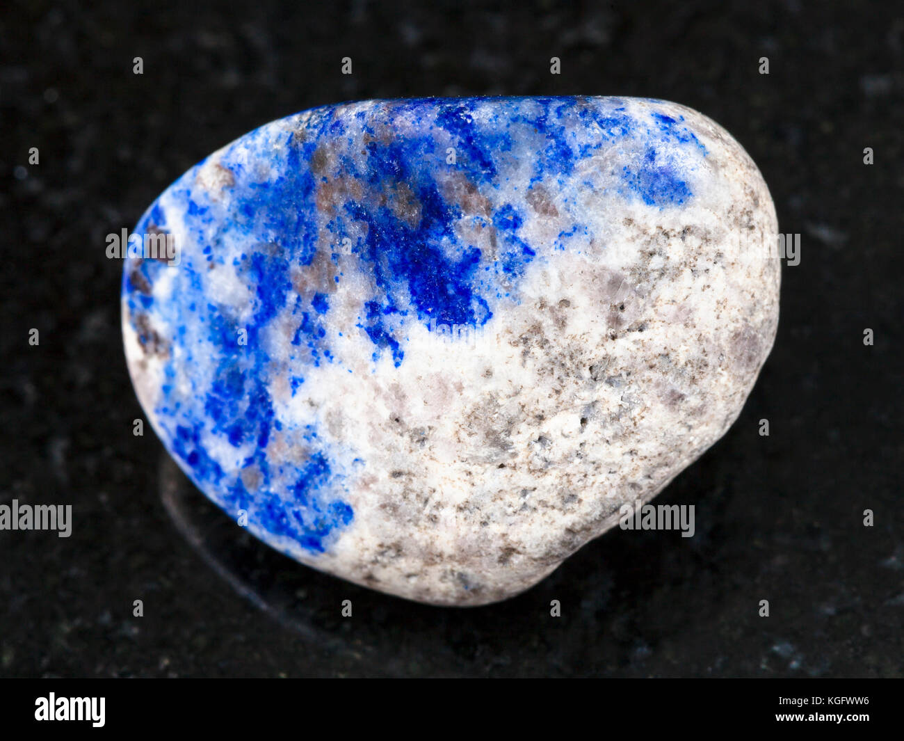 macro shooting of natural mineral rock specimen - polished lazurite ...