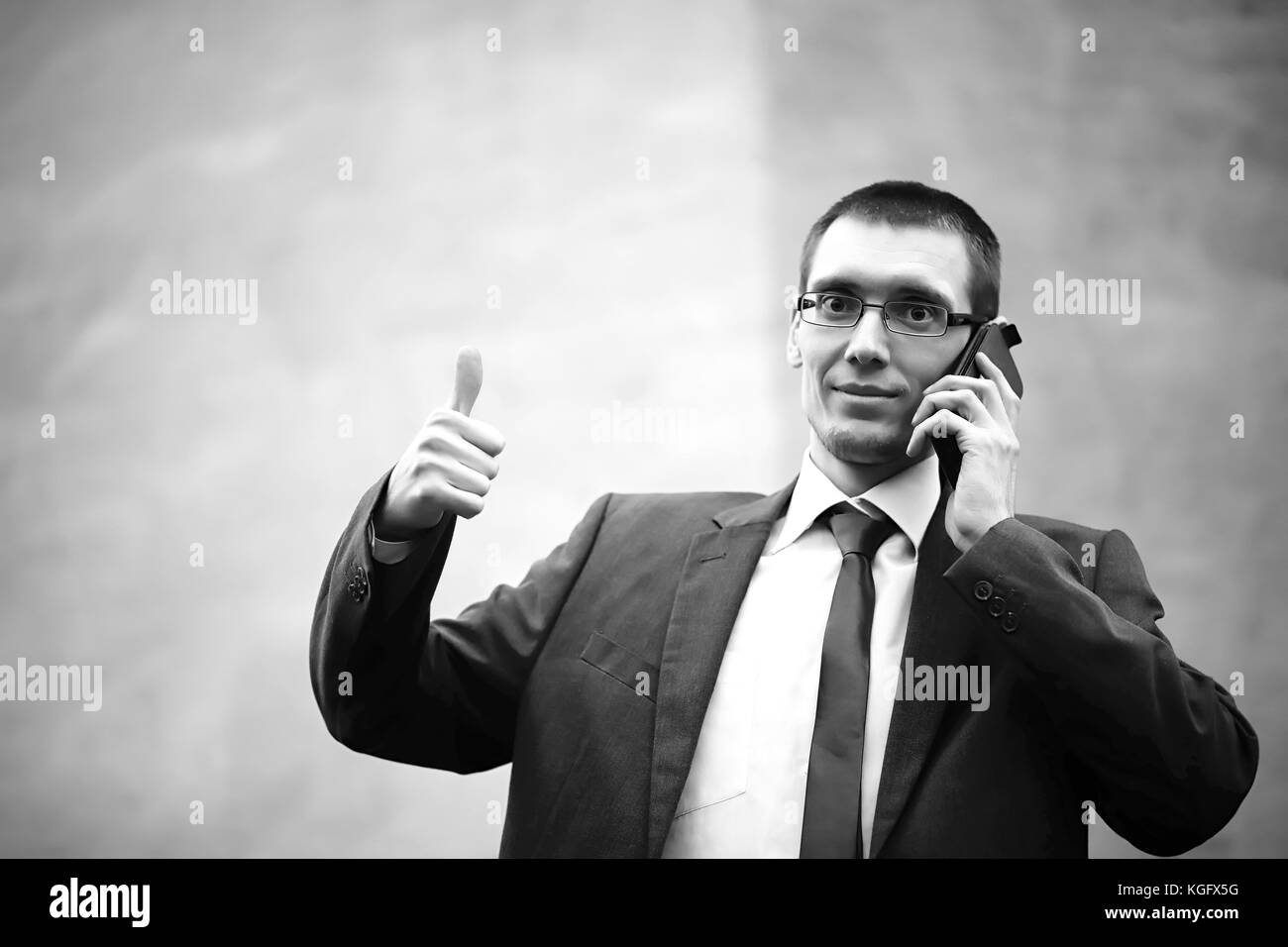 Businessman in city using Black and White Stock Photos & Images - Alamy