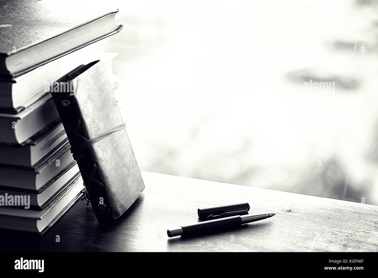 A stack of textbooks on a table Stock Photo - Alamy