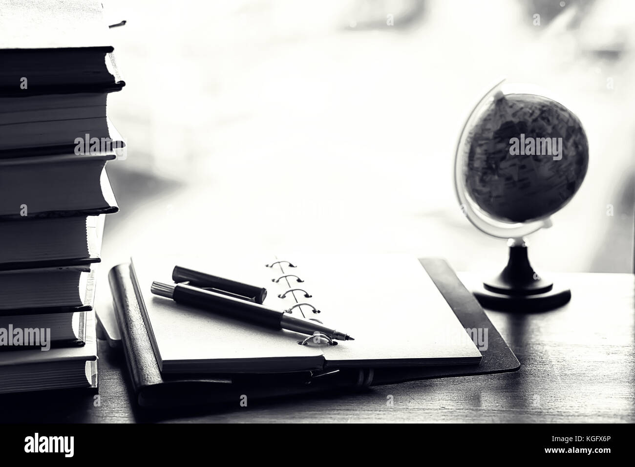 A stack of textbooks on a table Stock Photo - Alamy