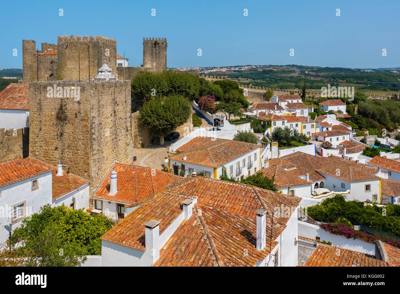 Rooftops of town and Castle. Obidos. Portugal Stock Photo - Alamy