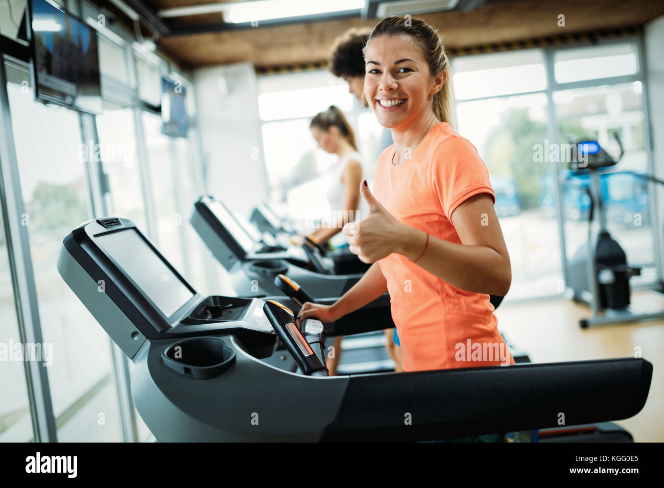 Young attractive woman doing cardio training in gym Stock Photo - Alamy