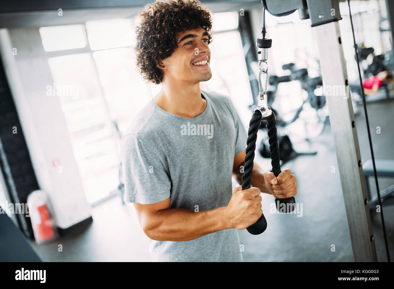 Portrait handsome bodybuilder doing exercise hi-res stock photography ...