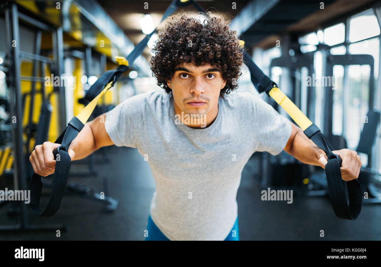 Portrait handsome bodybuilder doing exercise hi-res stock photography ...