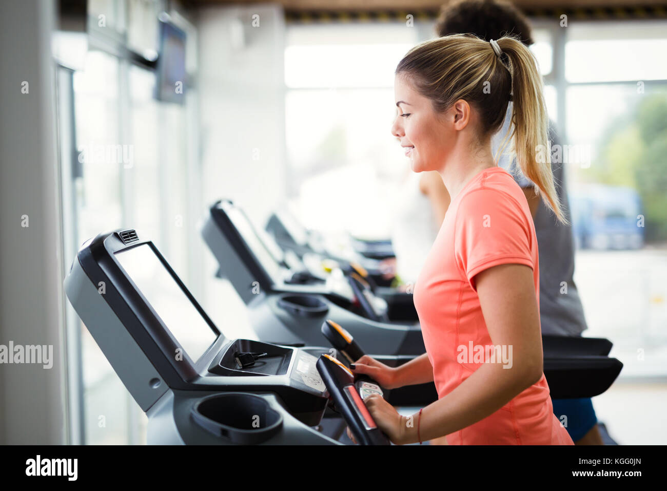 Gym woman attractive running hi-res stock photography and images - Alamy
