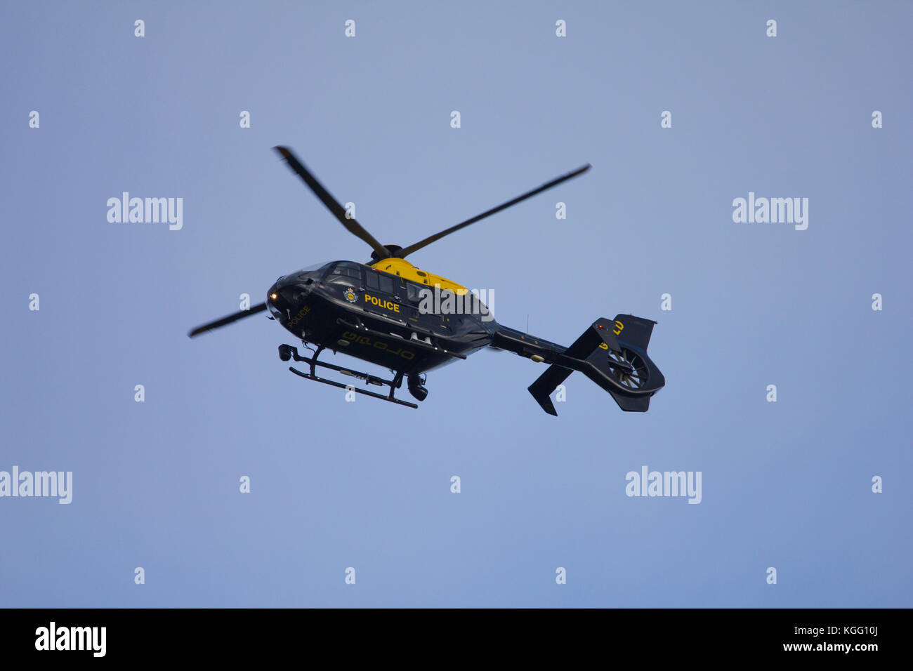 Police helicopter flying Stock Photo - Alamy