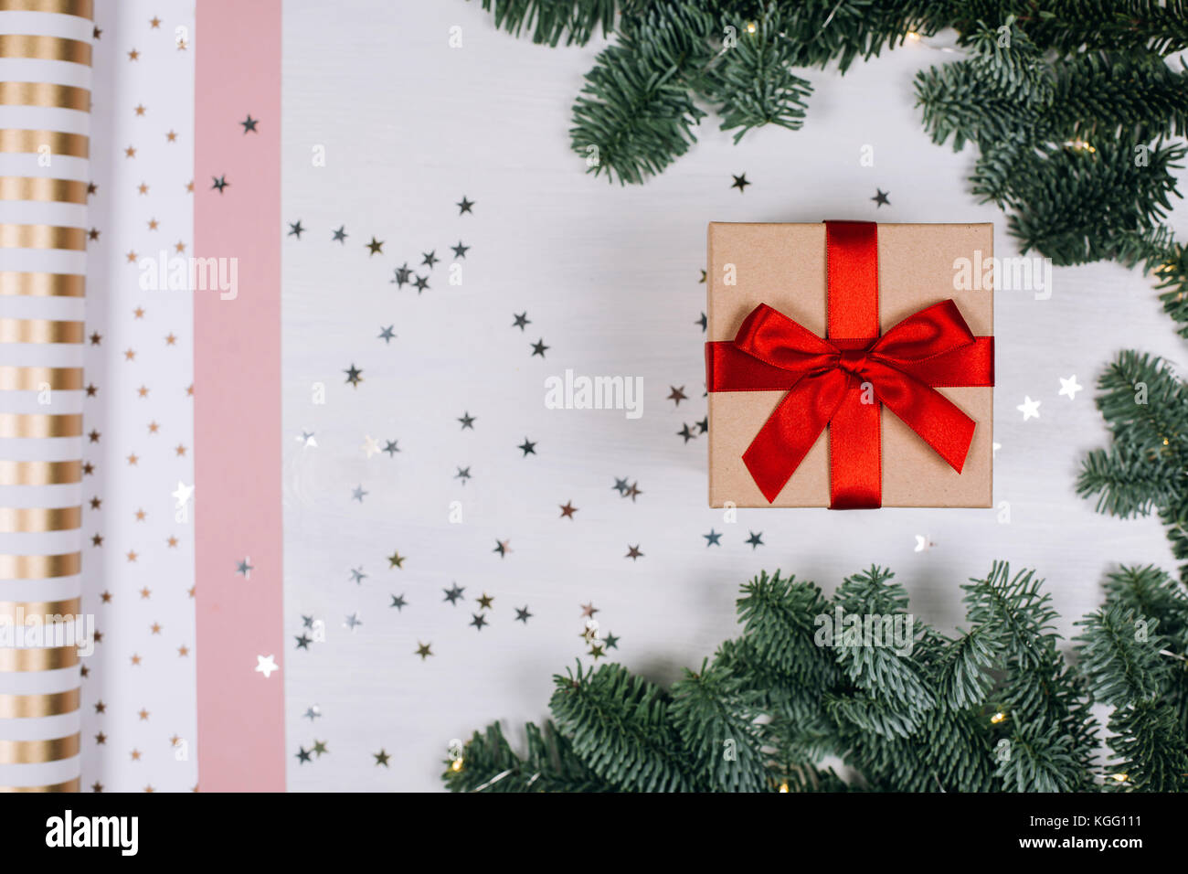 Christmas gift with red bow Stock Photo - Alamy