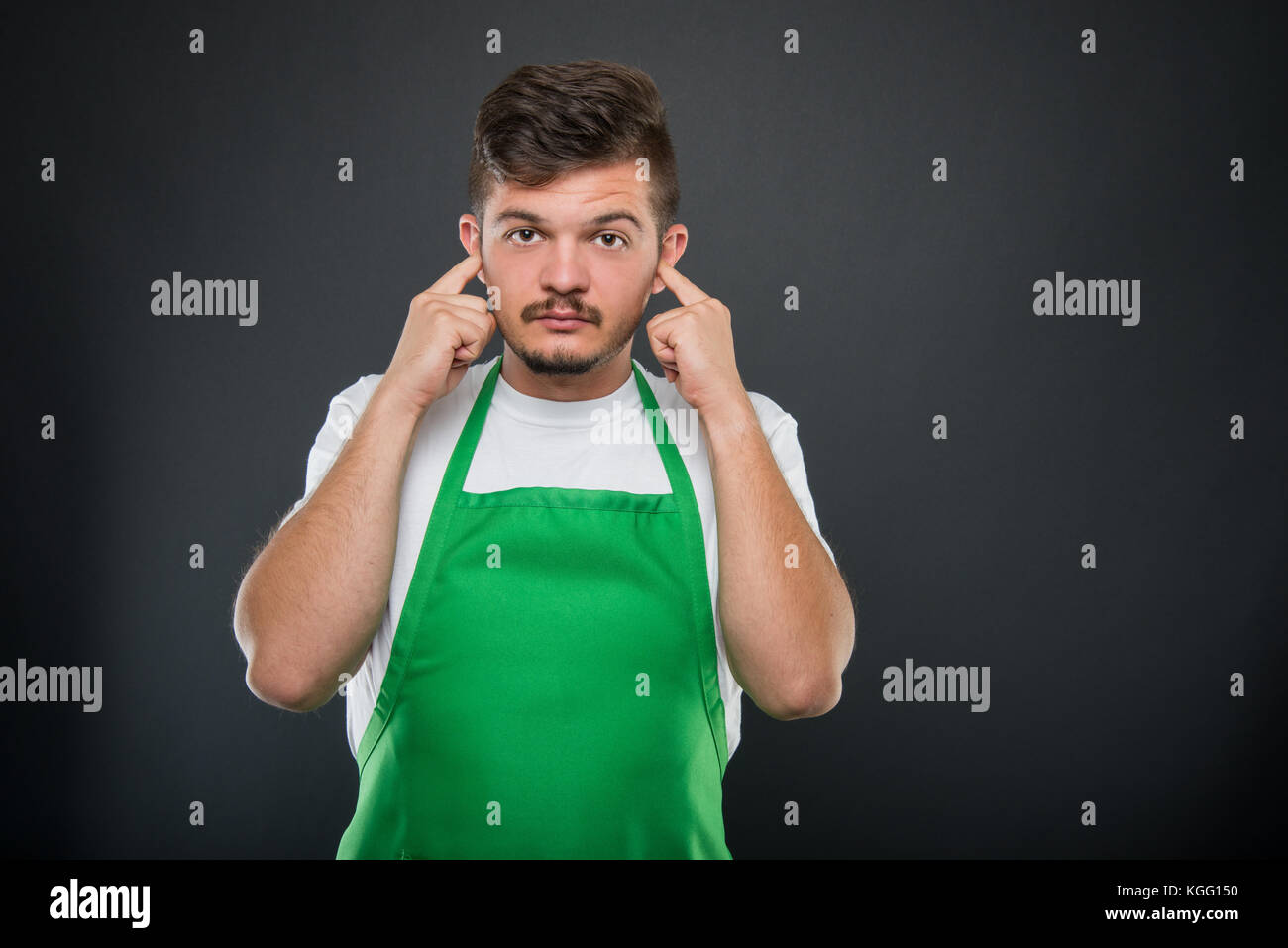 Portrait of supermarket employer gesturing deaf monkey concept on black ...