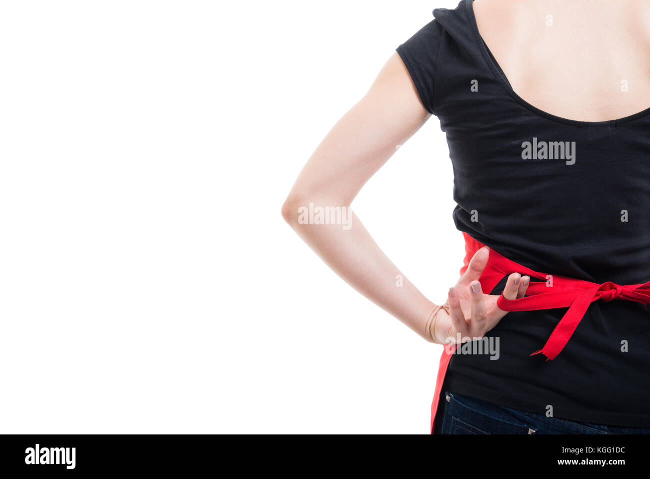 Girl seller tying a knot on apron behind her back on white background ...