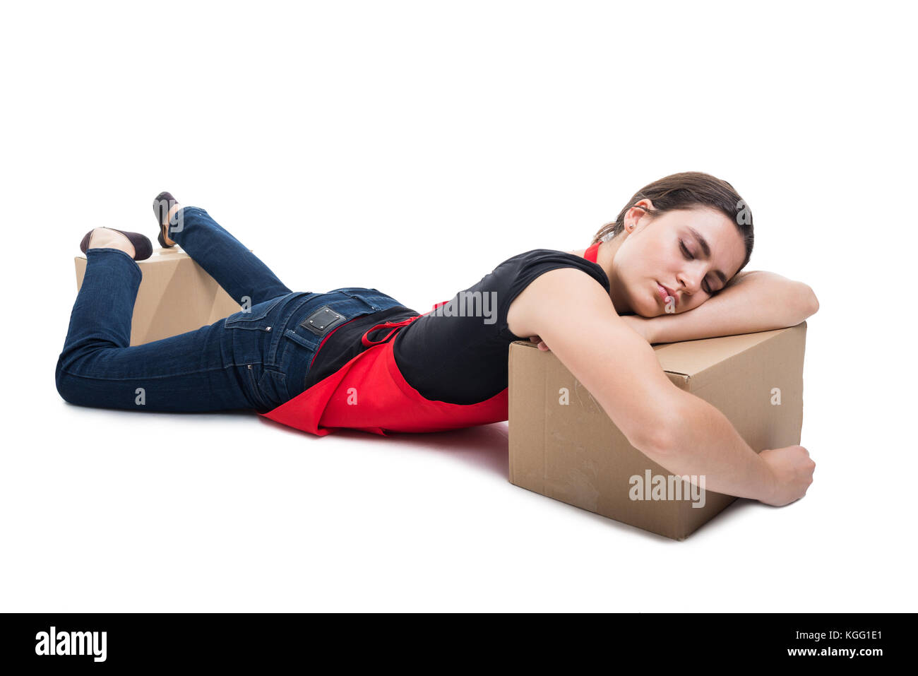 Supermarket seller lying down and sleeping on carton box Stock Photo ...