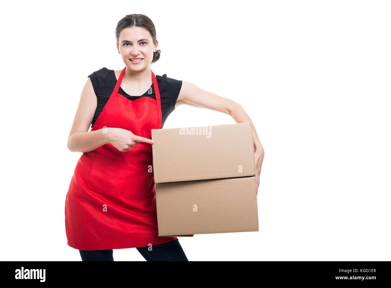 Woman seller smiling and carrying moving or storage boxes and pointing ...