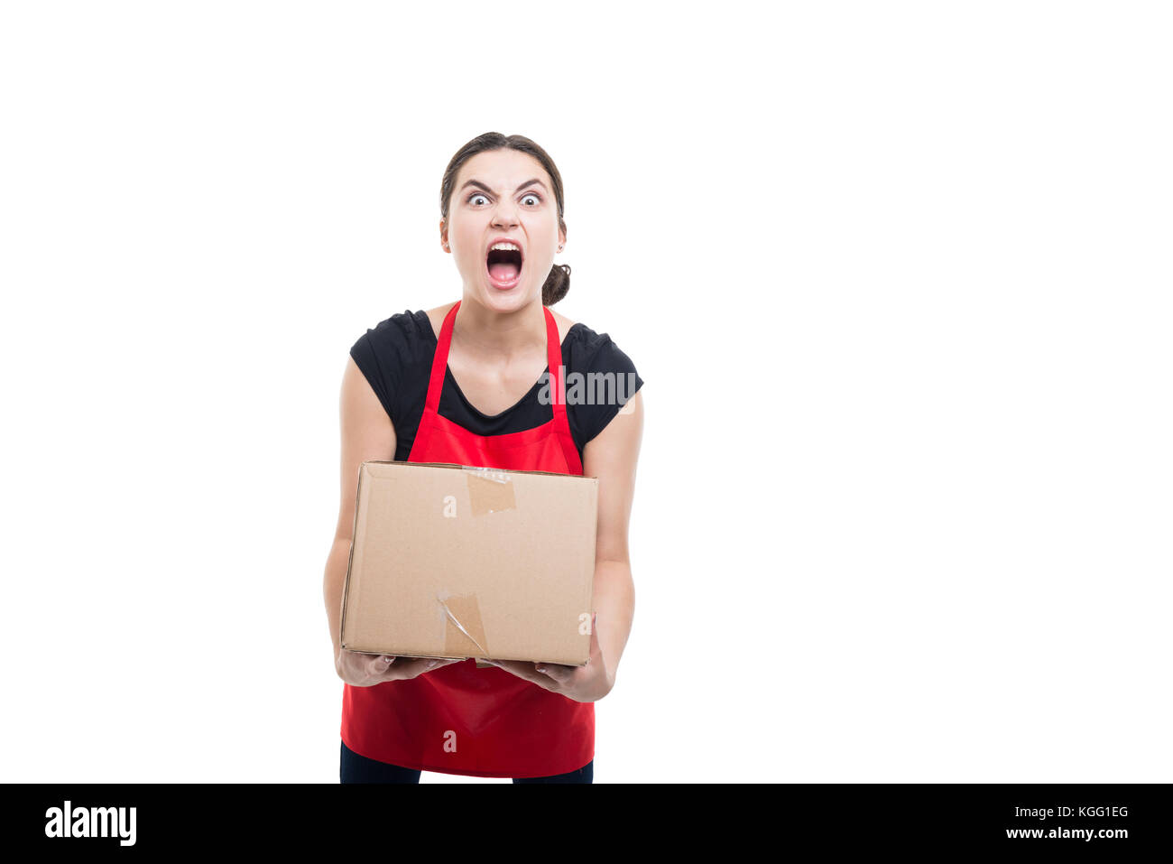 Angry supermarket clerk screaming with rage while carrying a cardboard ...