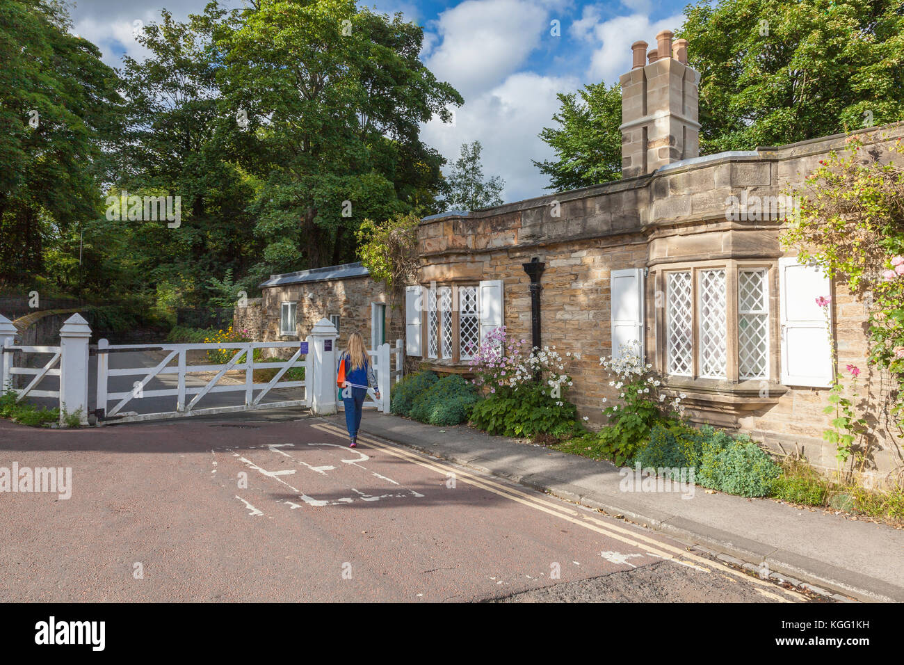 Woman gate cottage hi-res stock photography and images - Alamy