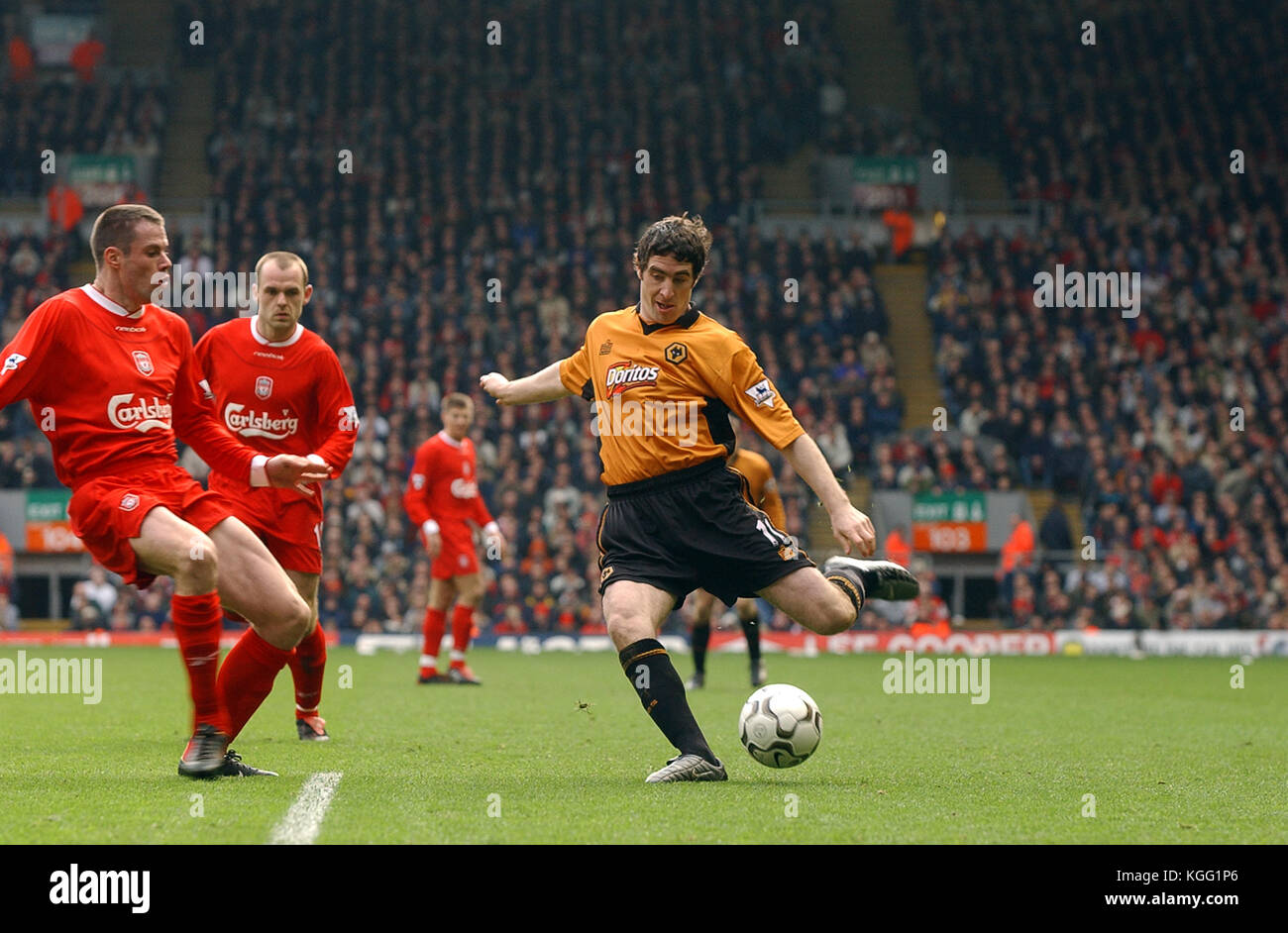 Footballer Jamie Carragher tackles Mark Kennedy Liverpool v ...