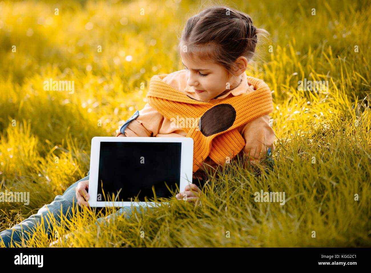 child showing digital tablet Stock Photo - Alamy