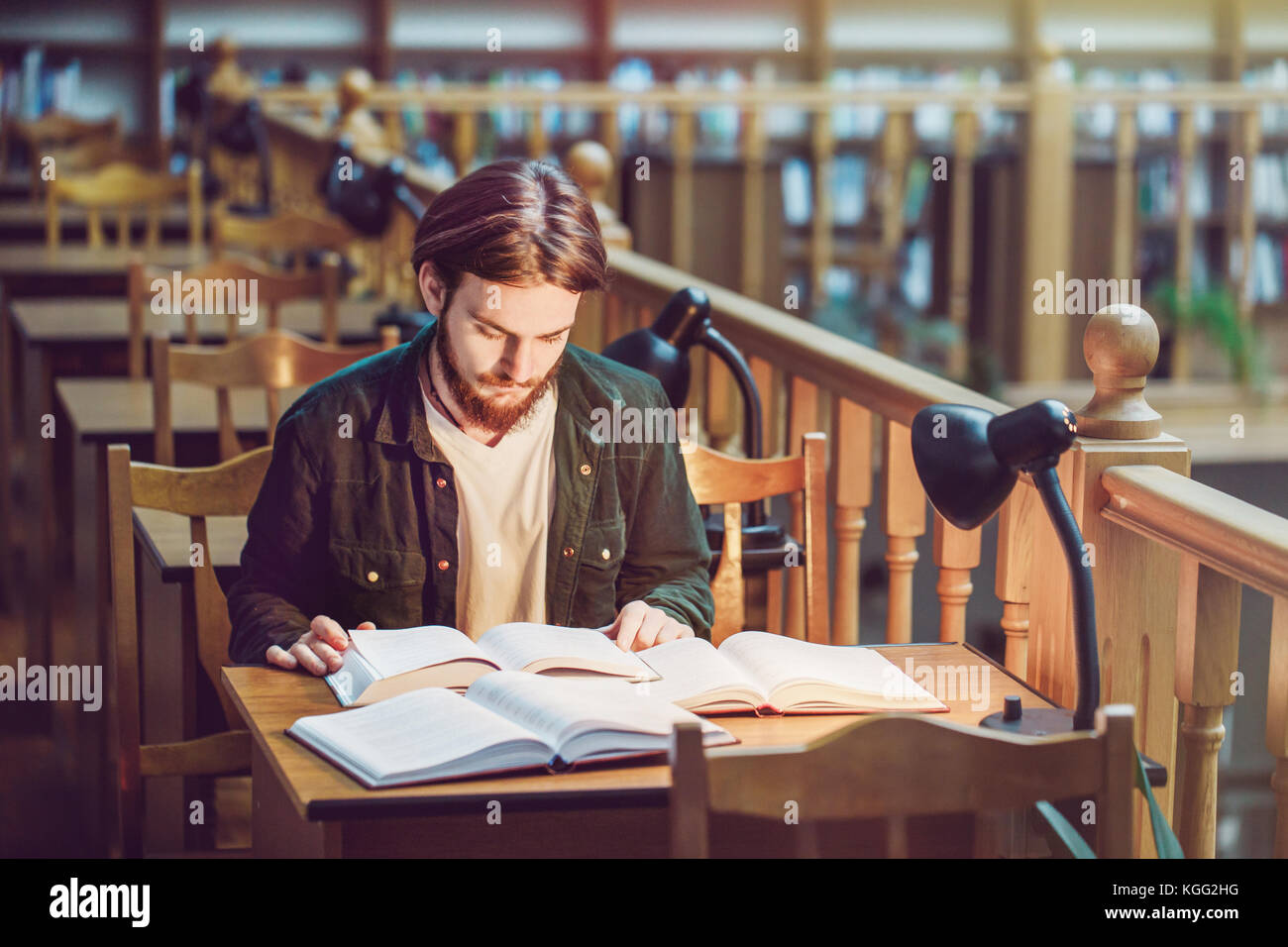 Student Man in the Library Stock Photo - Alamy
