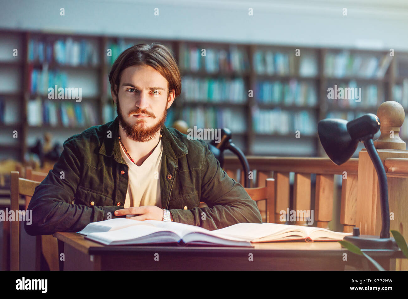 Portrait of Student Man in the Library Stock Photo - Alamy