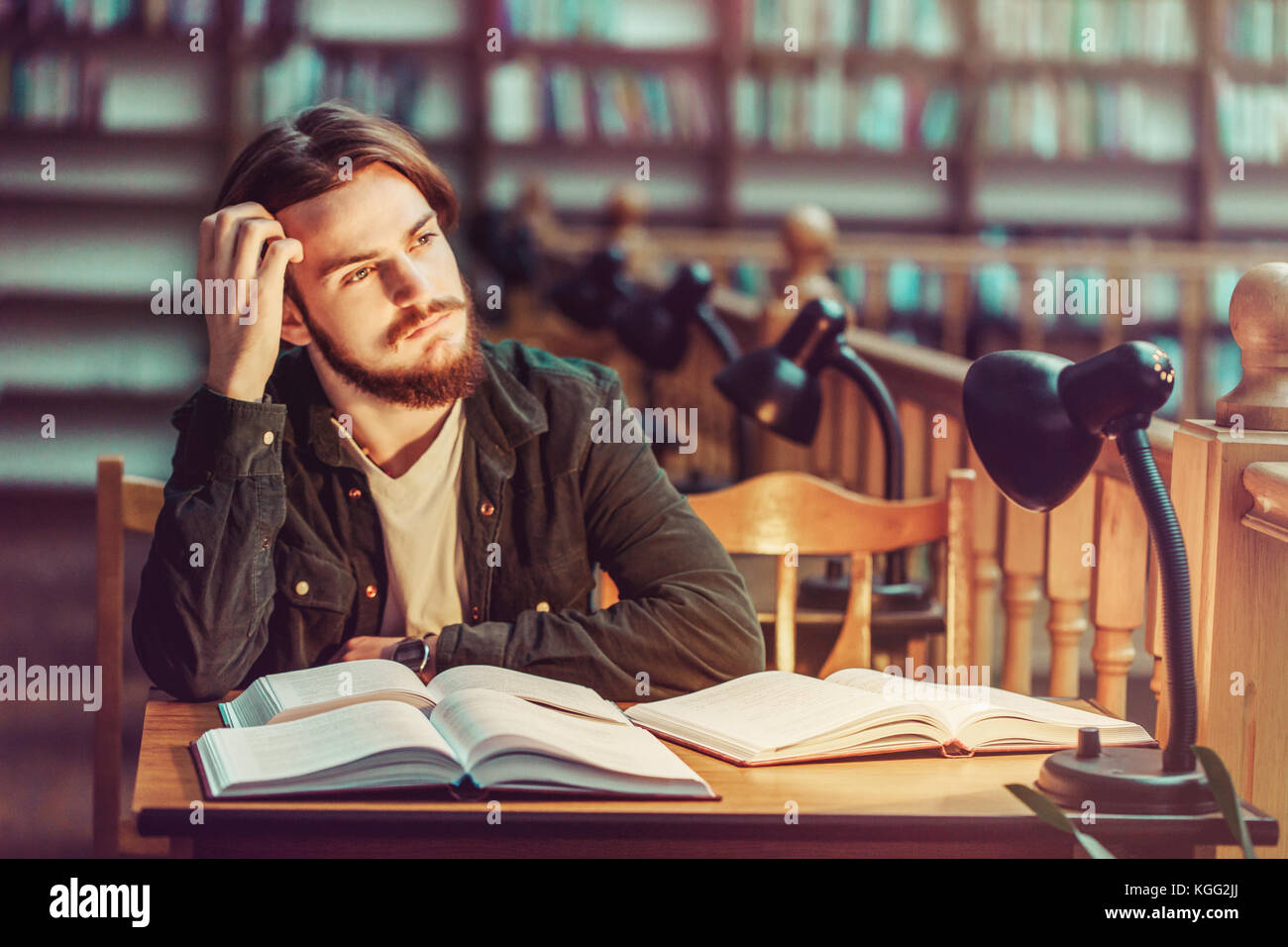 Portrait of Student Man in the Library Stock Photo - Alamy