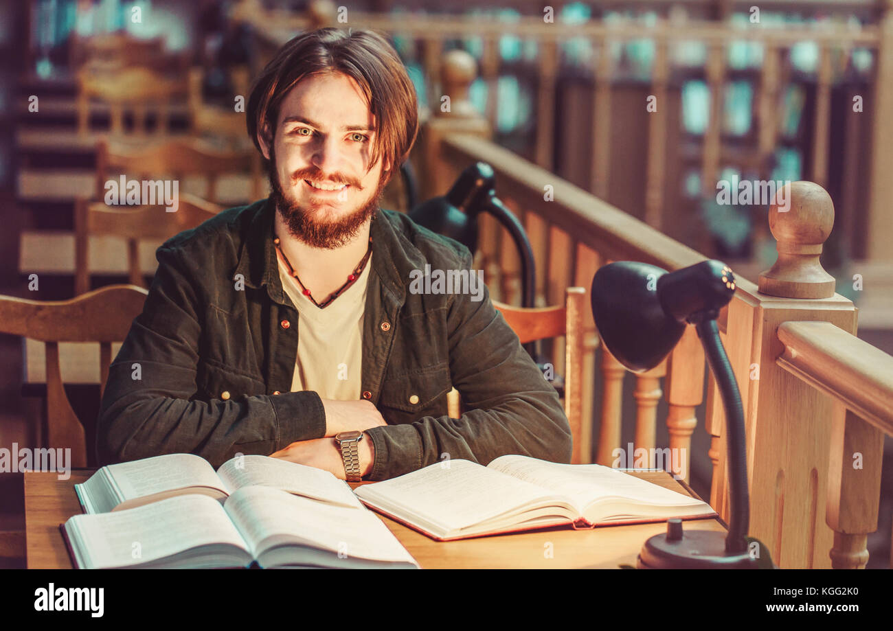 Portrait of Student Man in the Library Stock Photo - Alamy