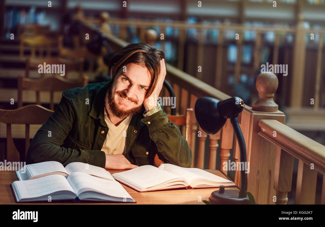 Portrait of Student Man in the Library Stock Photo - Alamy