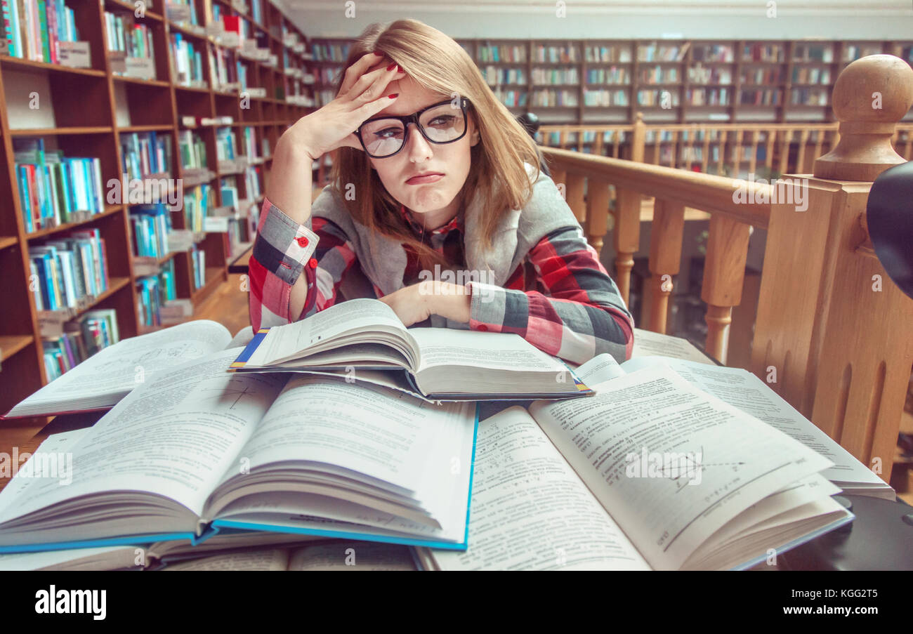 Girl Studying Hard in Library Stock Photo - Alamy