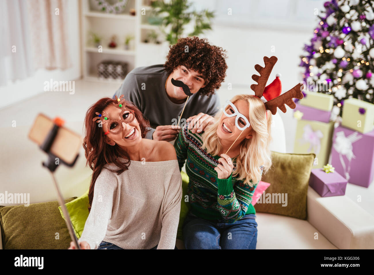 Christmas Surprise With Three Friends High Resolution Stock Photography ...
