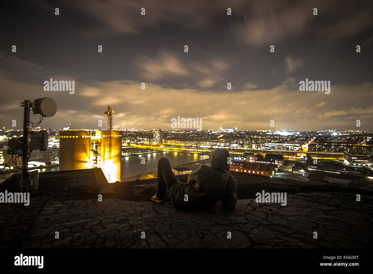 Urban squatter gained access to a rooftop in an industrial area of ...