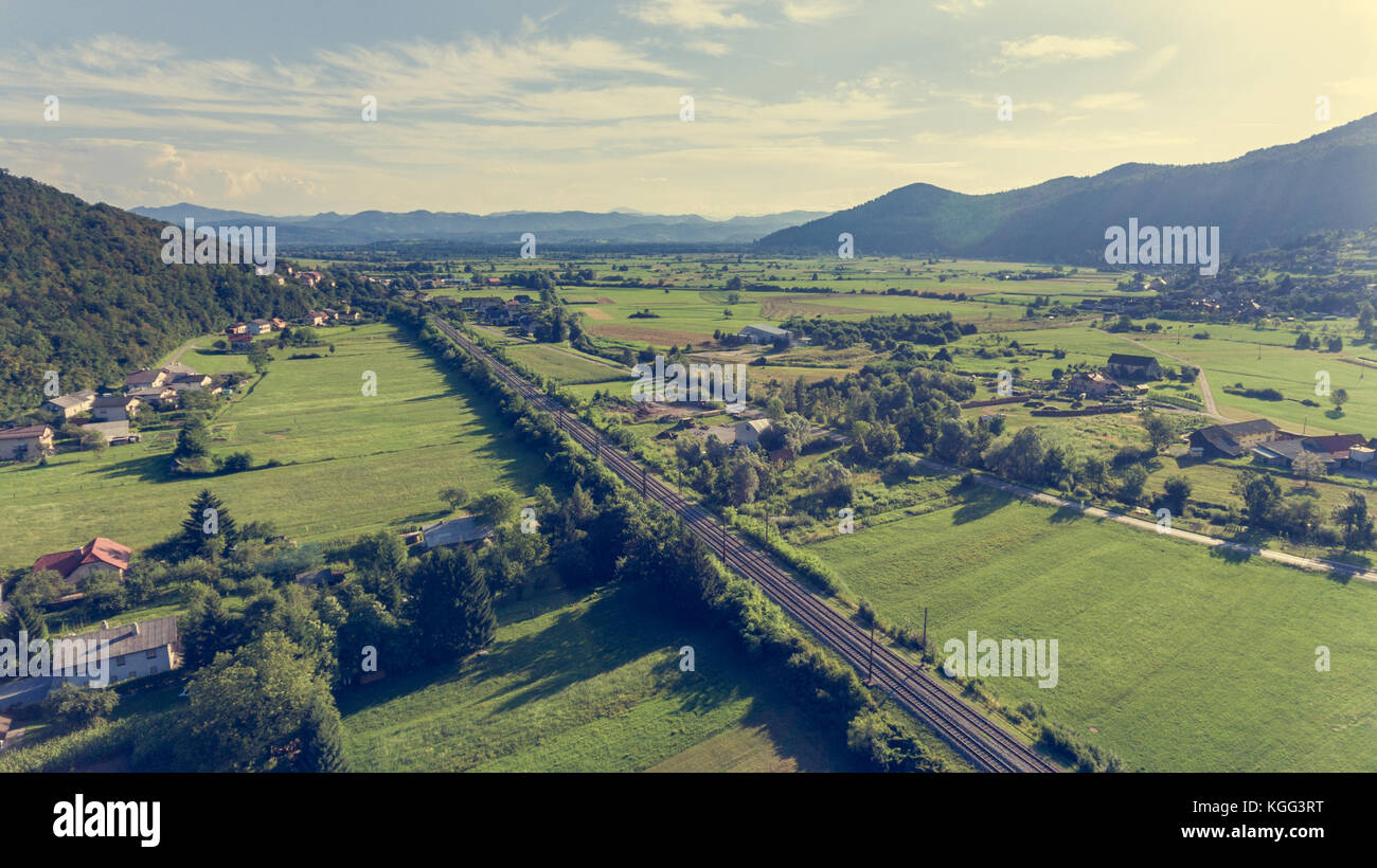 Aerial view of railroad running through fields Stock Photo - Alamy