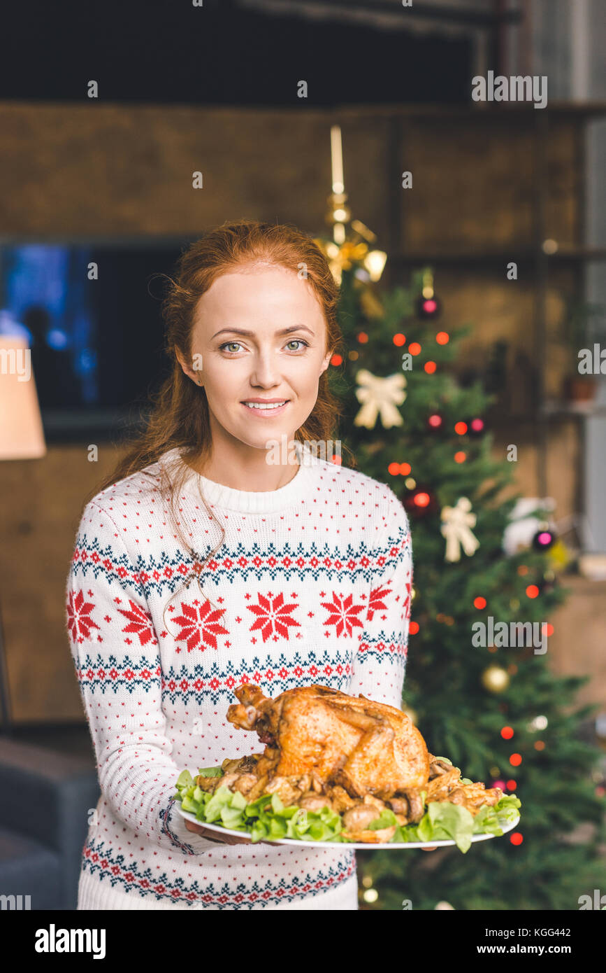 woman with fried chicken for christmas Stock Photo - Alamy