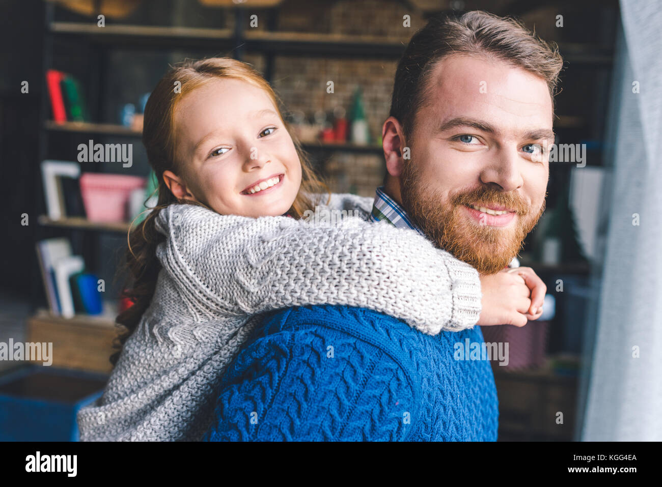 Child piggybacking hi-res stock photography and images - Alamy
