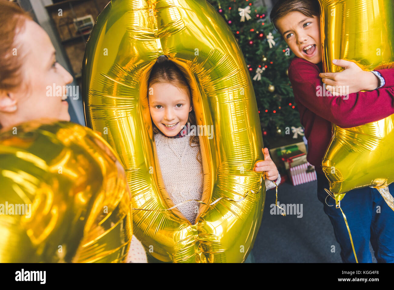 family having fun on new year Stock Photo - Alamy
