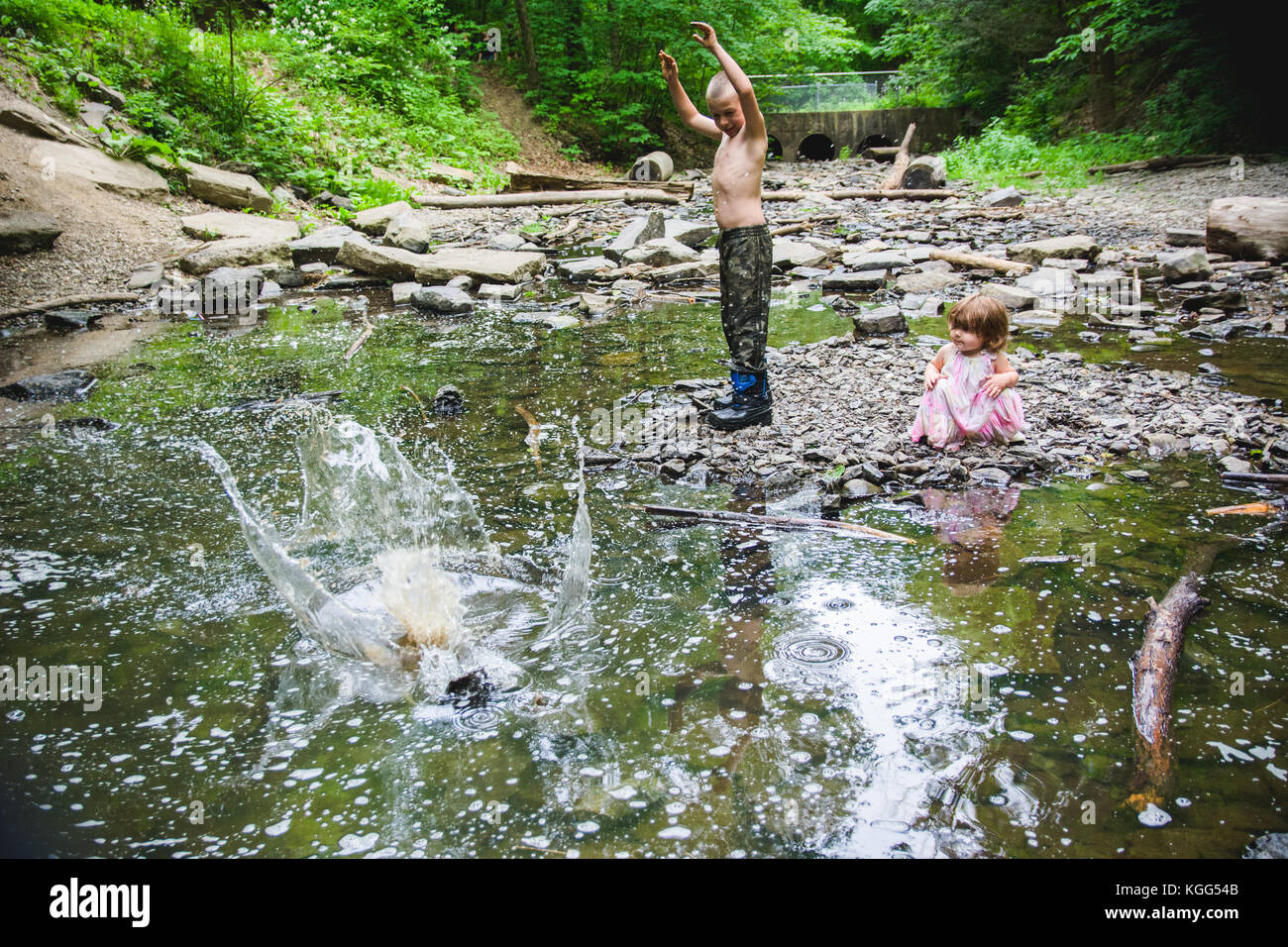 Children throwing rocks hi-res stock photography and images - Alamy