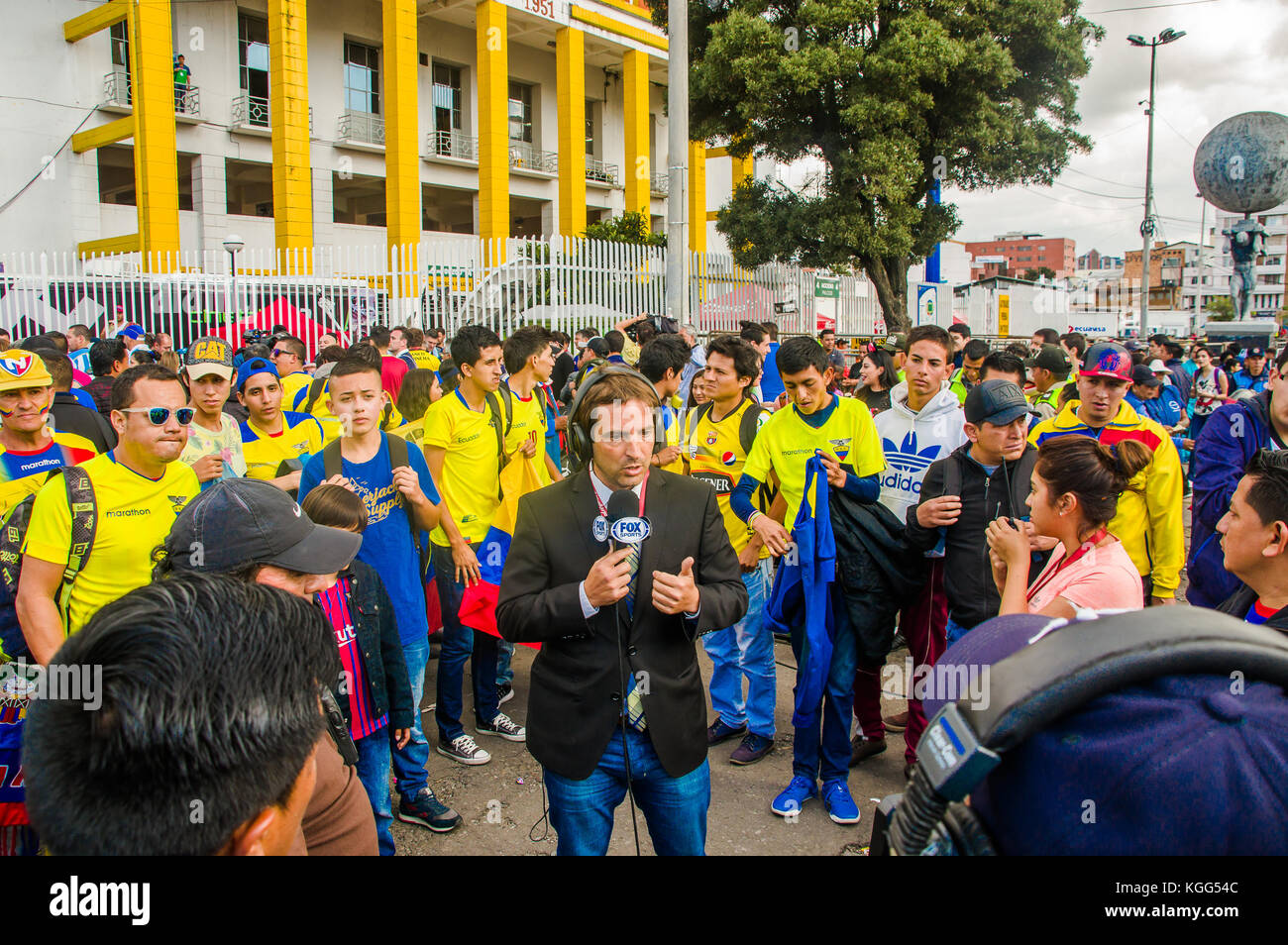 QUITO, ECUADOR - OCTOBER 11, 2017: Close up of reporter talking to some ...