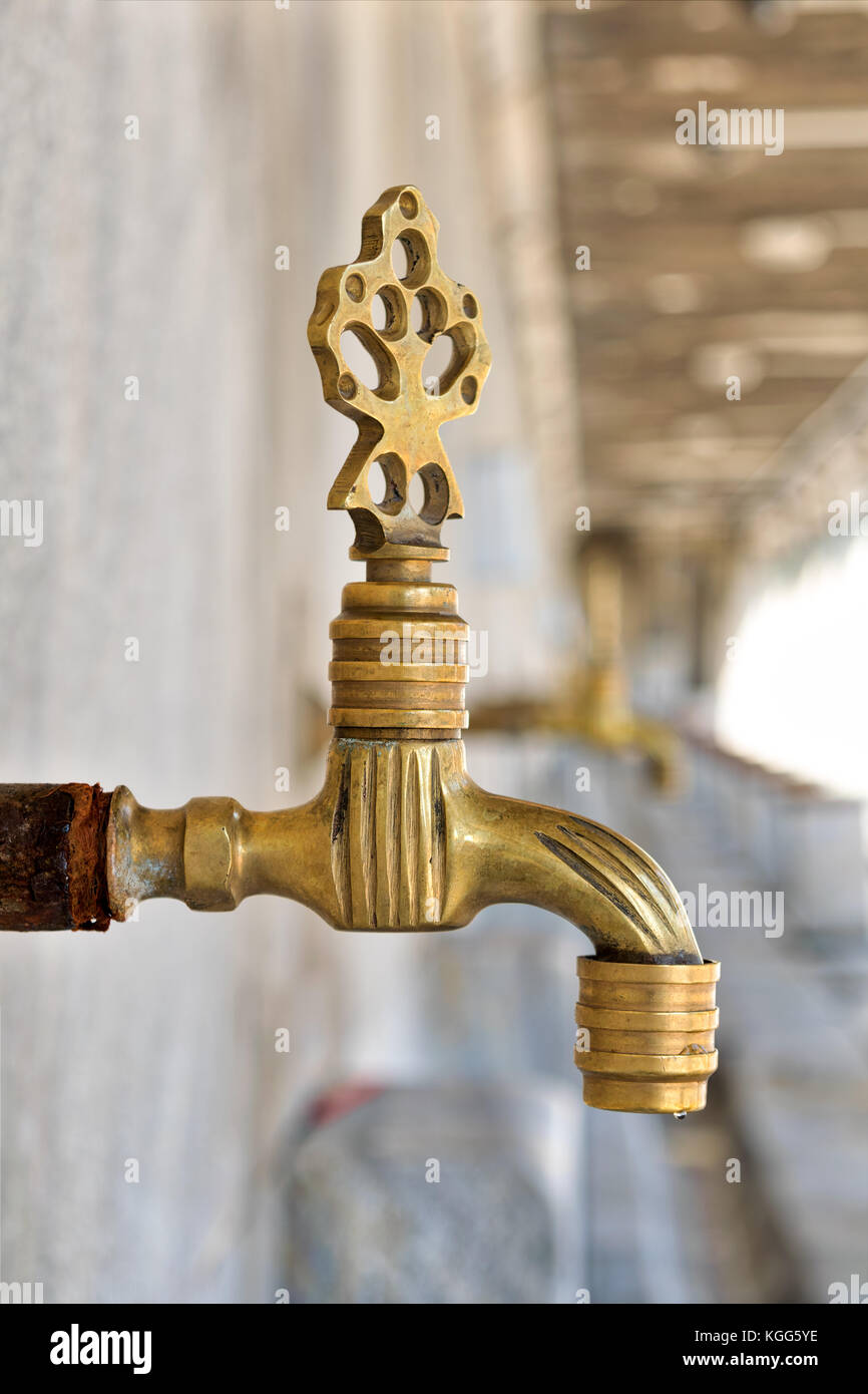 Turkish Ottoman style antique ablution tap with blurred background ...