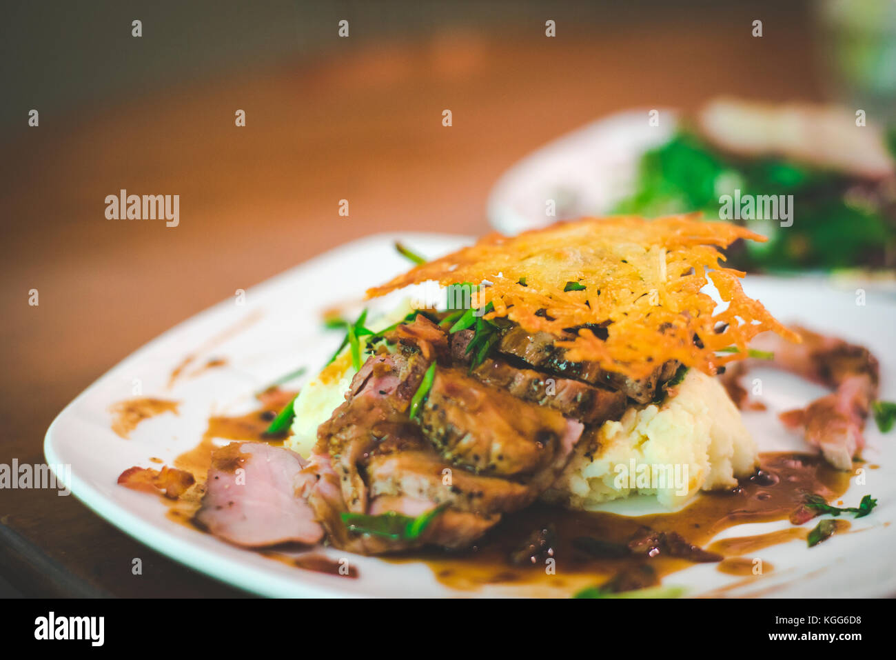A fine dining presented on a plate in a restaurant Stock Photo - Alamy