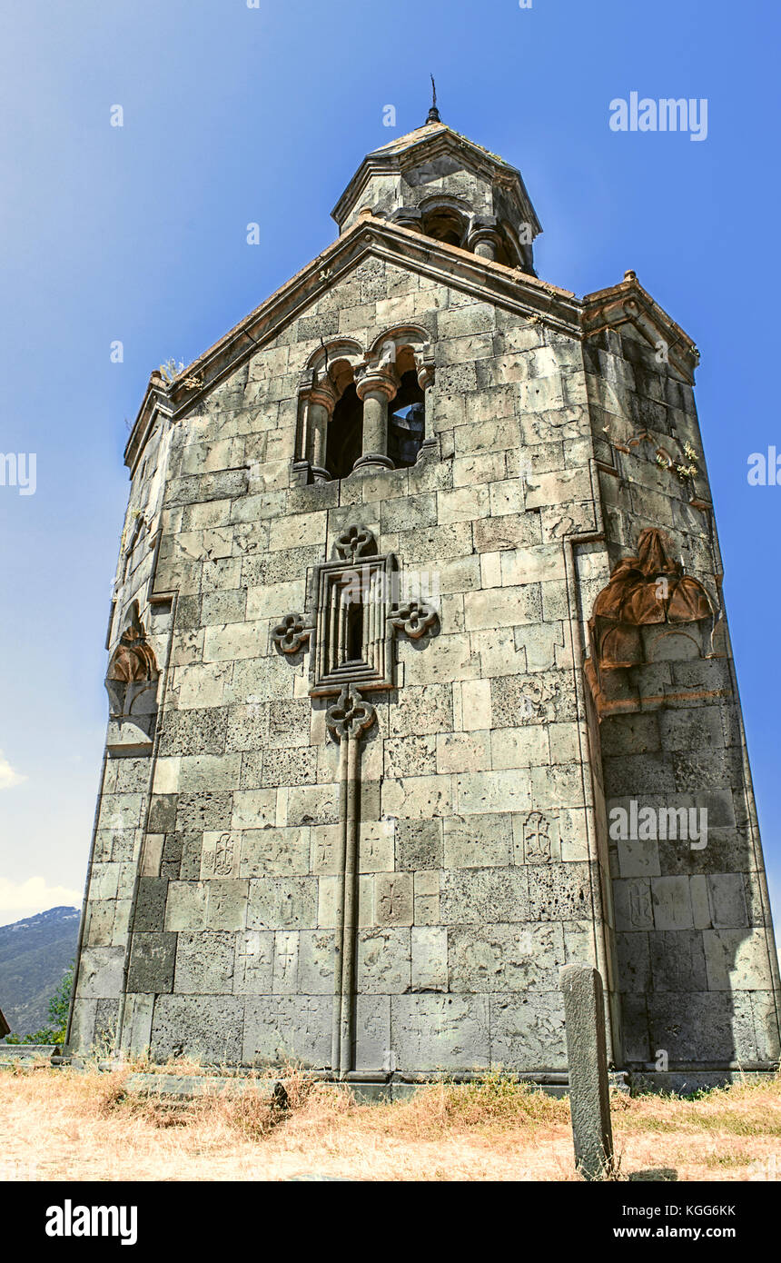 Bottom view on of the tall tower the bell tower in the monastery of ...