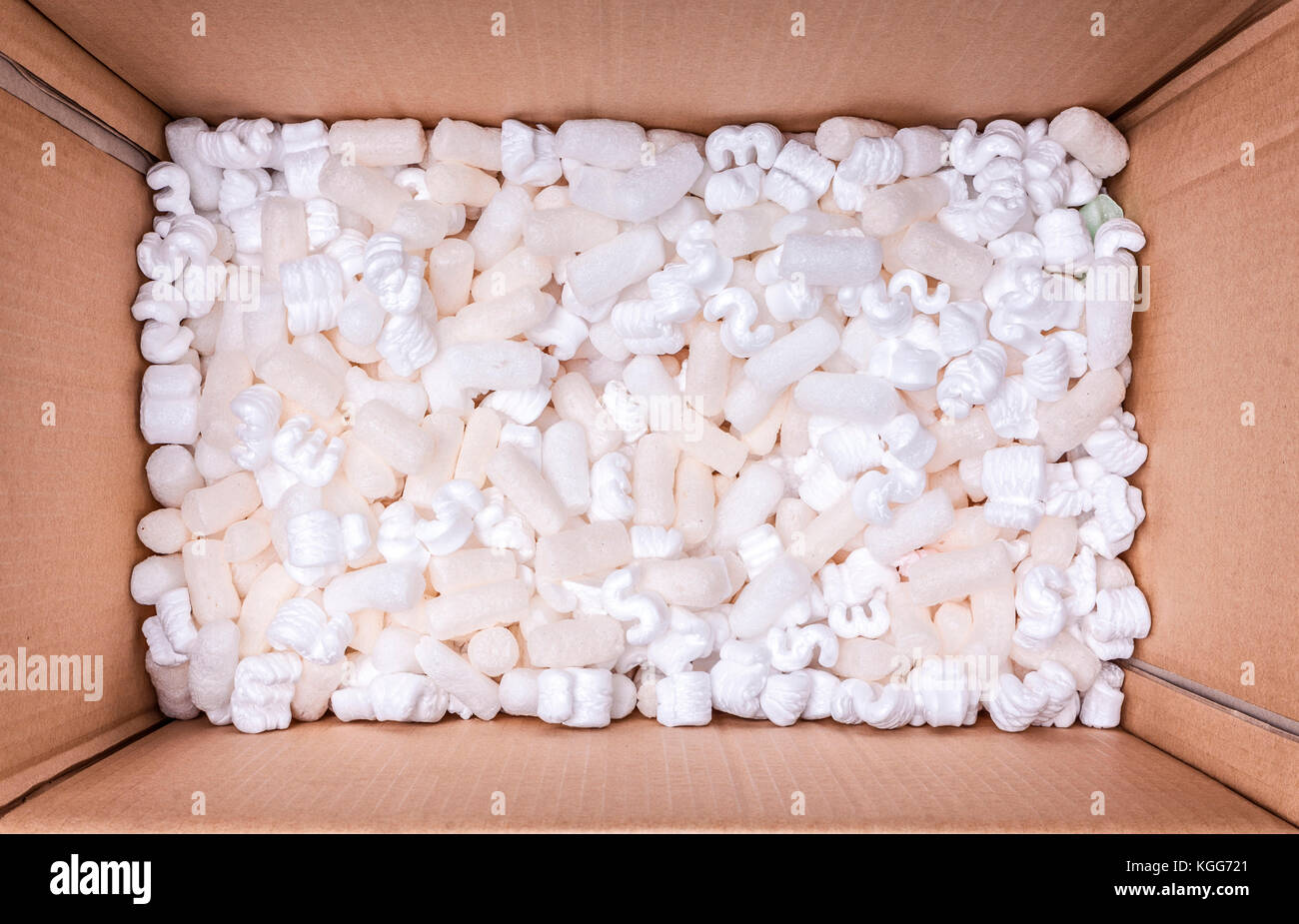 box packaging with polystyrene peanuts inside Stock Photo - Alamy