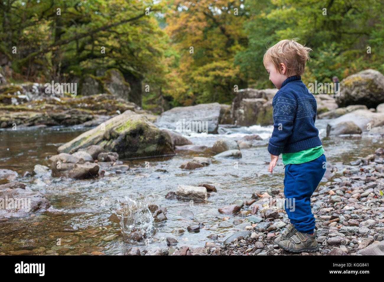 Boy throwing stones hi-res stock photography and images - Alamy