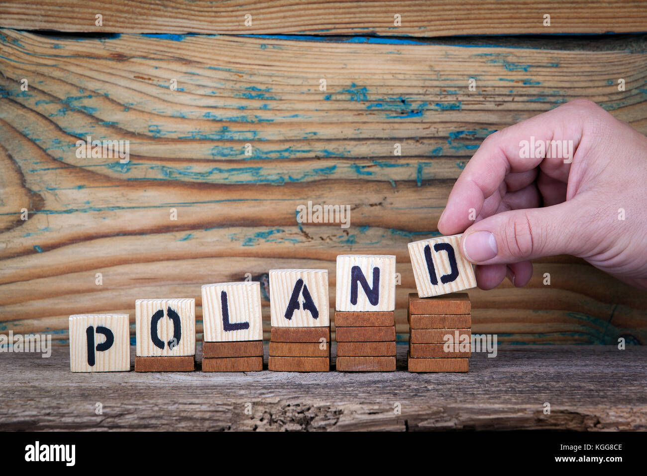 Poland. Wooden letters on the office desk, informative and ...