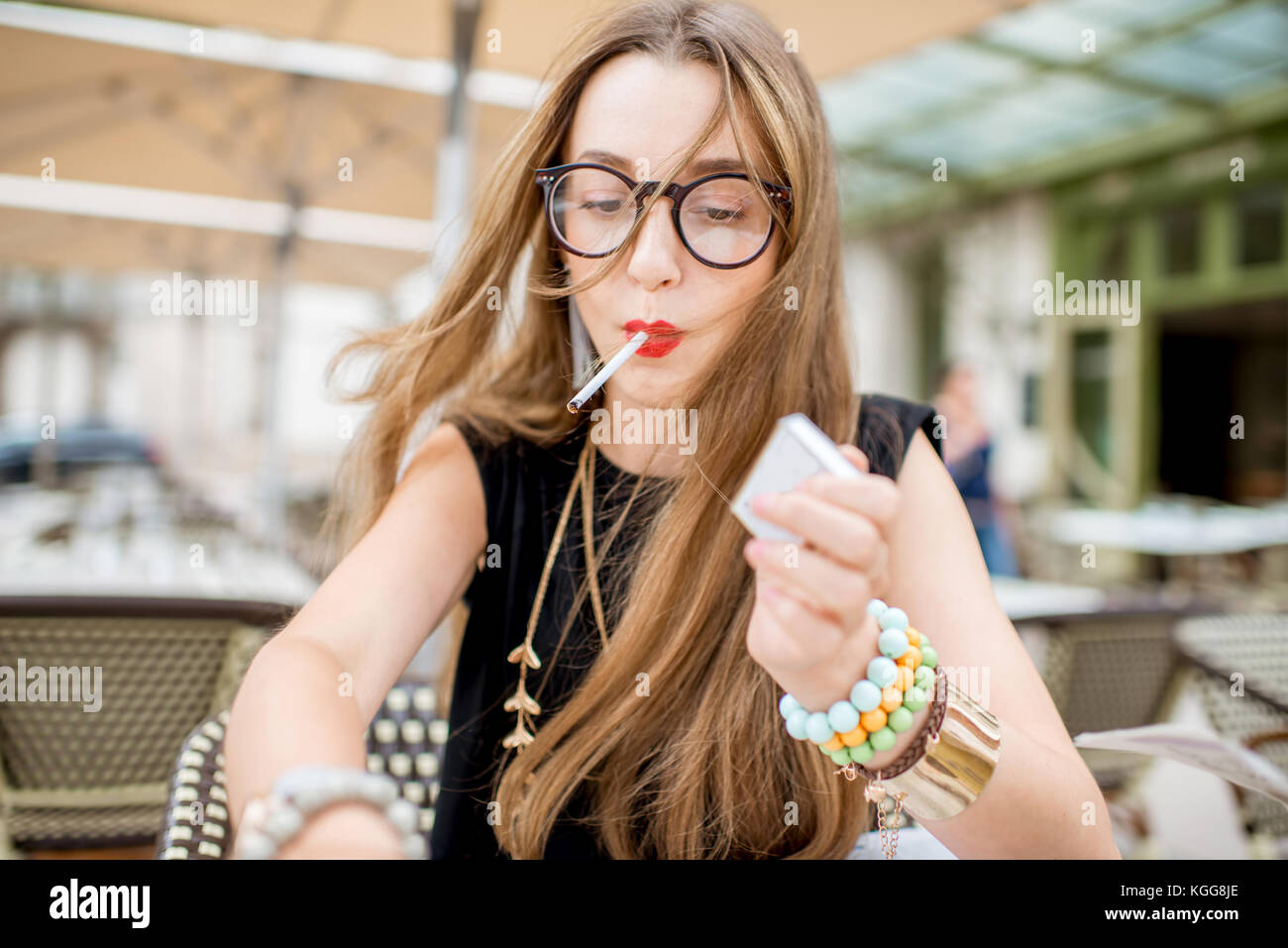 Smoking woman at the french cafe Stock Photo - Alamy