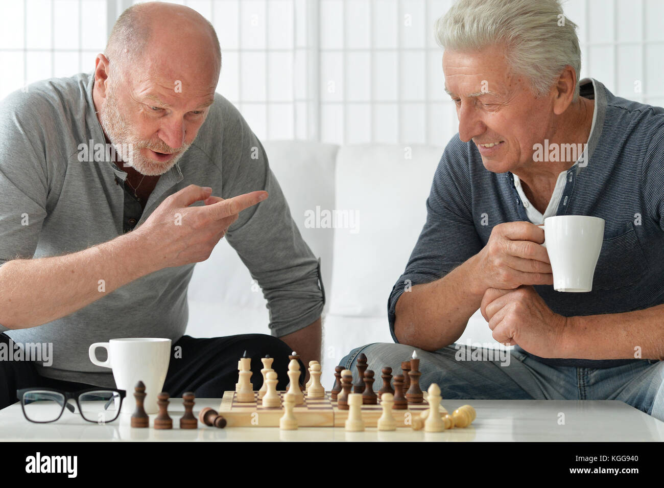 senior men playing chess Stock Photo - Alamy