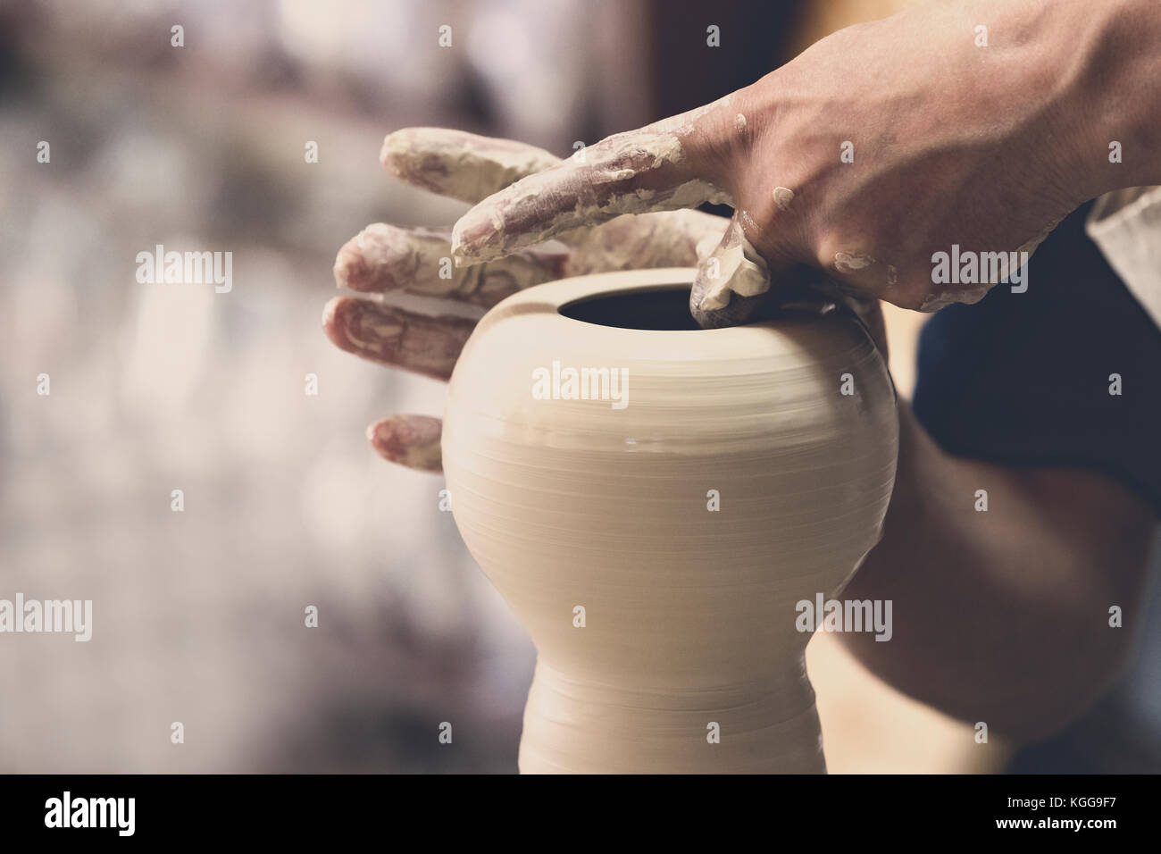 Potter makes pottery handmade in the workshop Stock Photo - Alamy